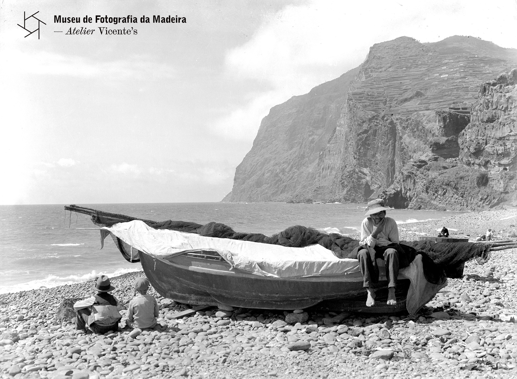 Cultura Madeira - Man sitting on a fishing boat